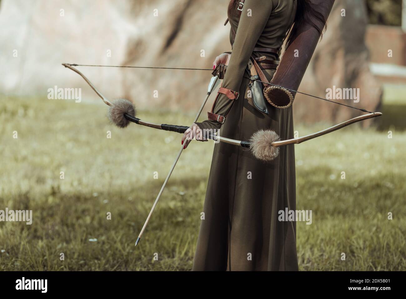 Bow and arrow close-up, female archer Stock Photo - Alamy