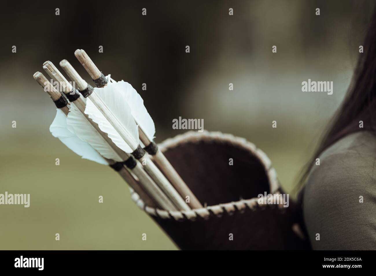 Ancient quiver with arrows on the back of a woman archer Stock Photo ...