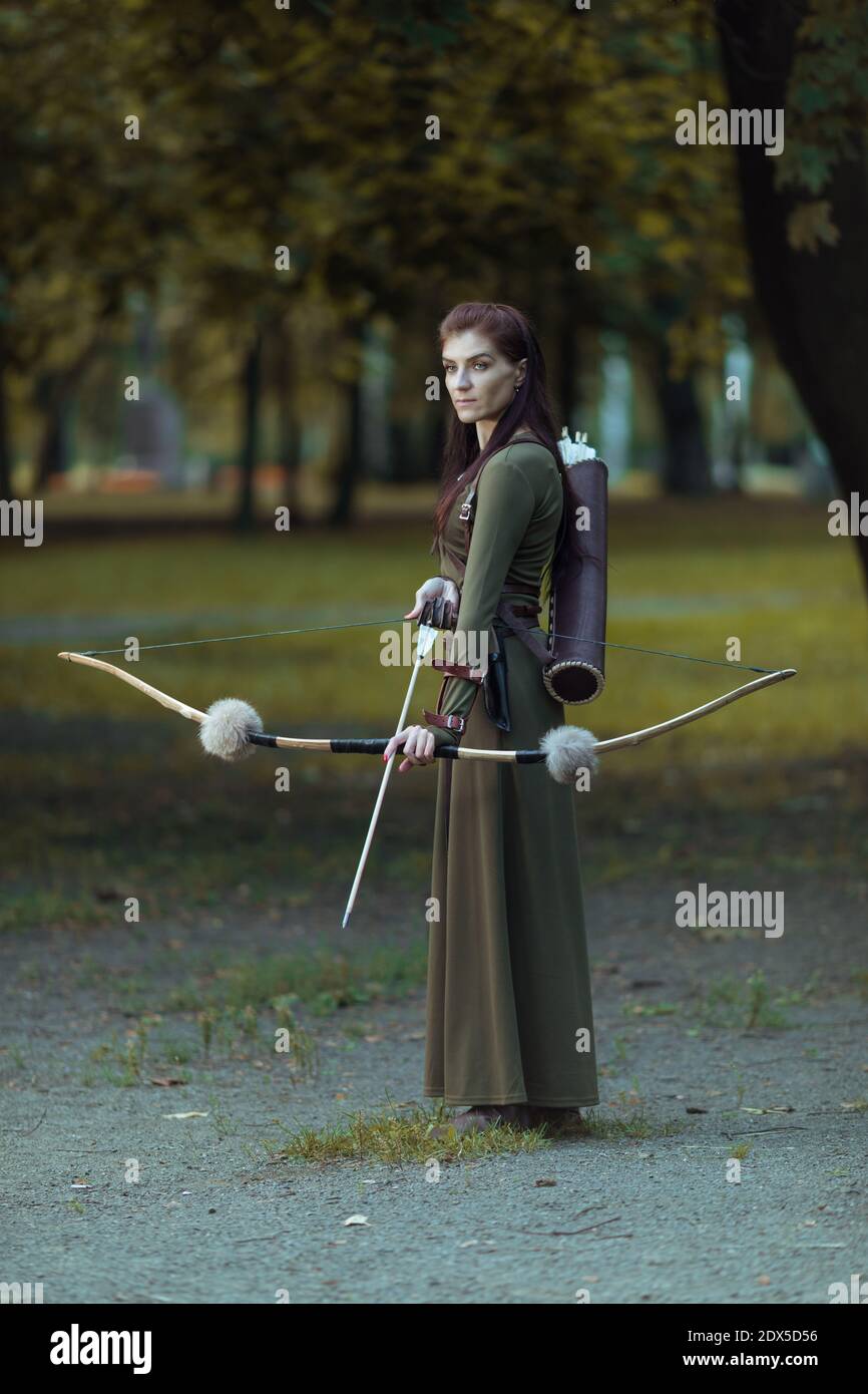 Portrait of lovely woman with ancient quiver with arrows and bow Stock ...