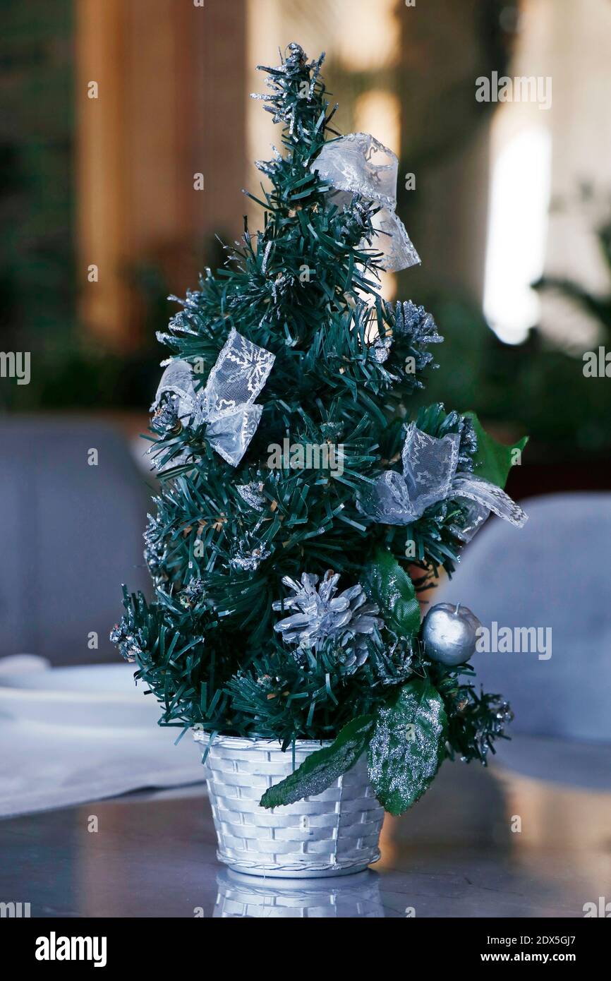 Silver decorated christmas fir tree hi-res stock photography and images ...
