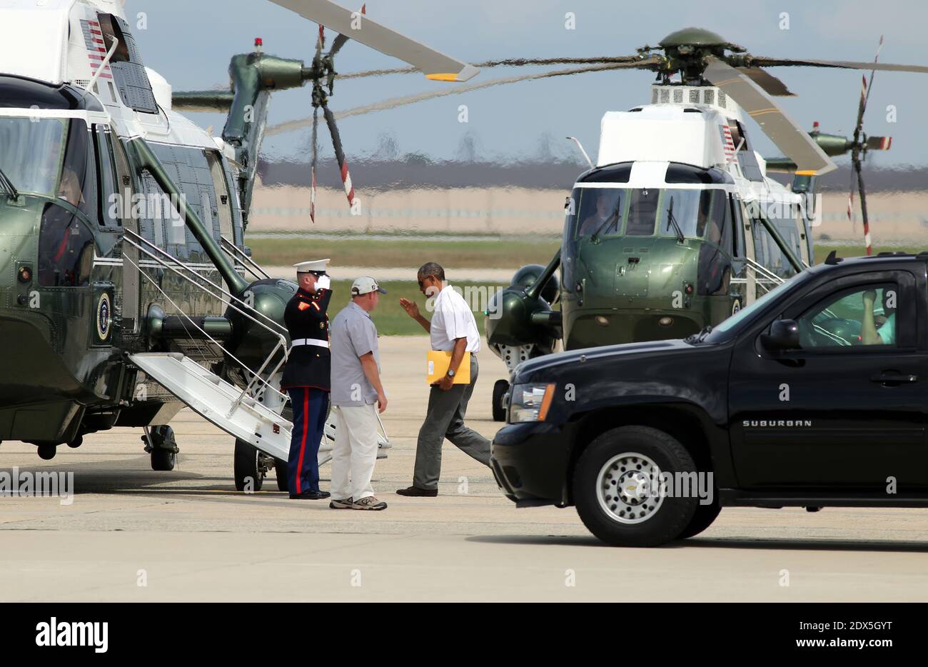 President Barack Obama boards Marine One en route Camp David following ...