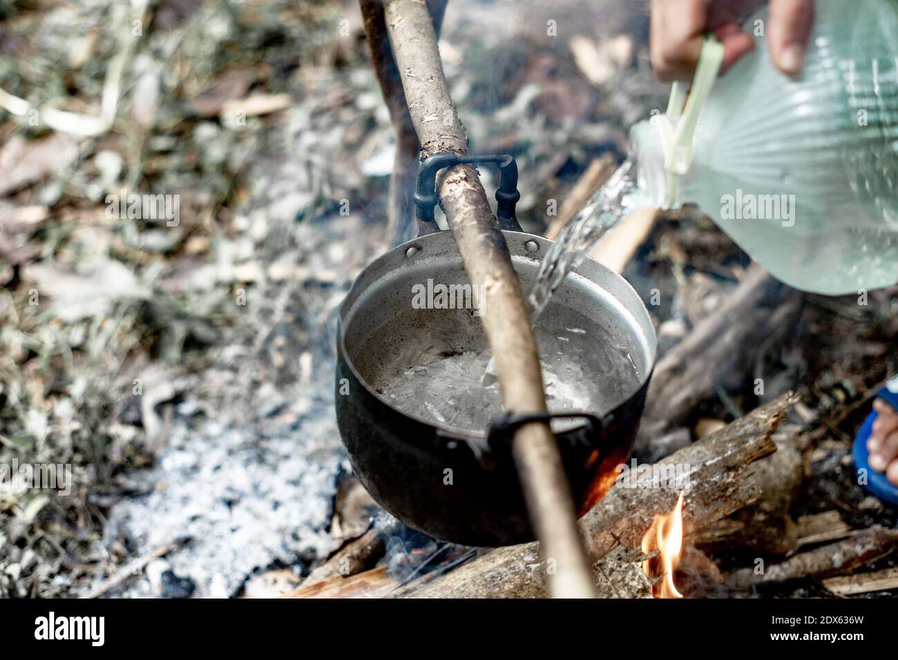 Pouring water on fire hi-res stock photography and images - Alamy