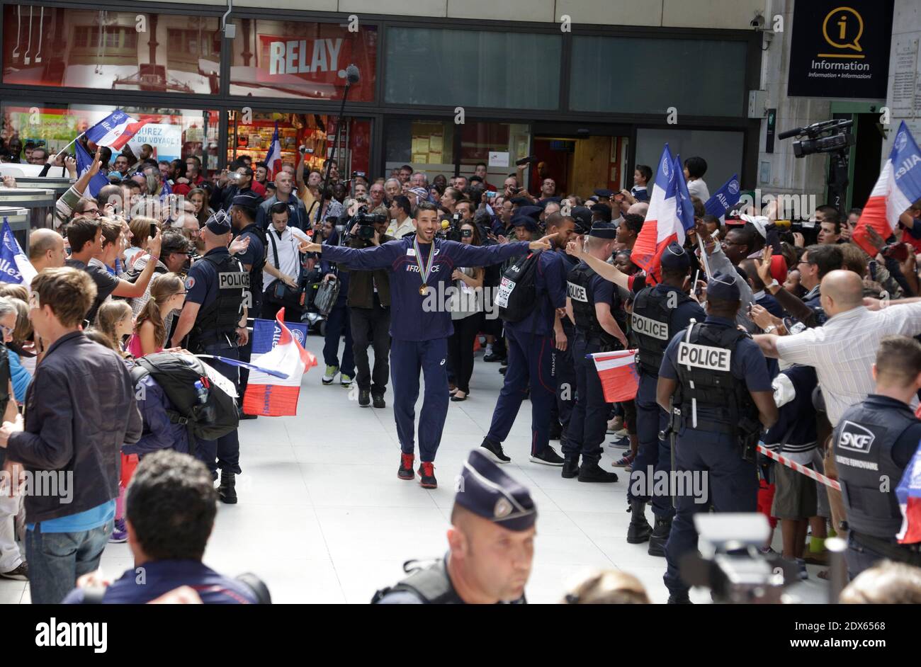 French Athlet Mahiedine Mekhissi welcomed by the crowd as he arrives at ...
