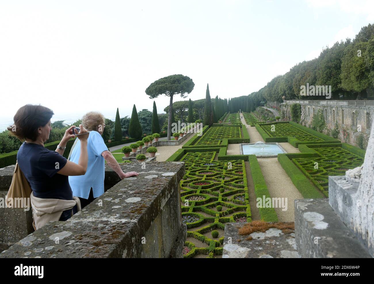 Tourists visit the papal gardens of the pope's summer residence of ...
