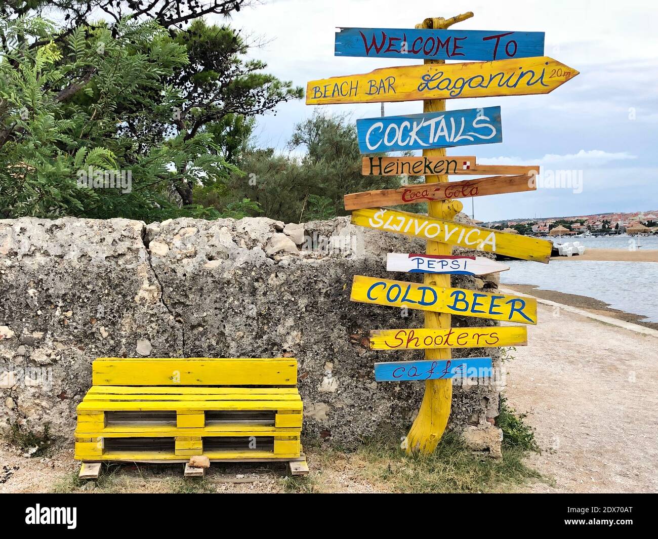 Information Signs On Wooden Post At Beach Stock Photo - Alamy