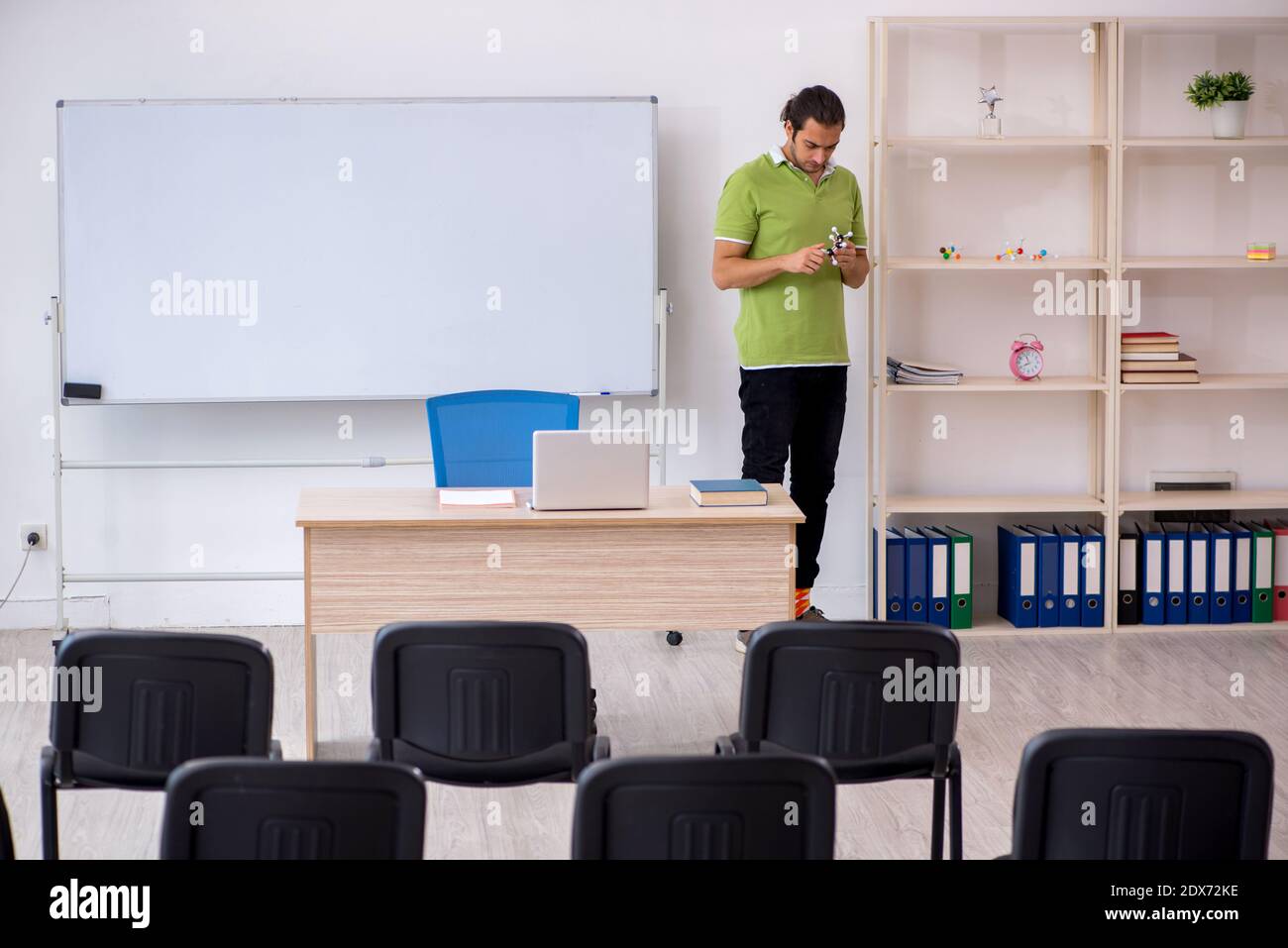 Young student in business presentation concept Stock Photo - Alamy
