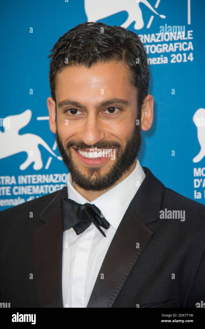 Adam Tsekhman posing at the photocall of "Tsili" at the 71st Venice ...