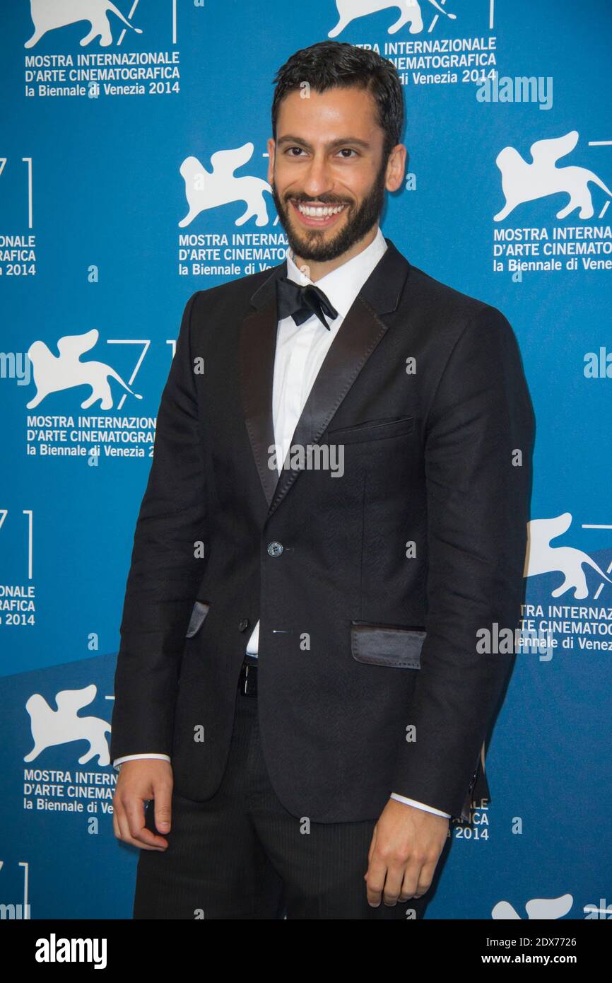 Adam Tsekhman posing at the photocall of "Tsili" at the 71st Venice ...