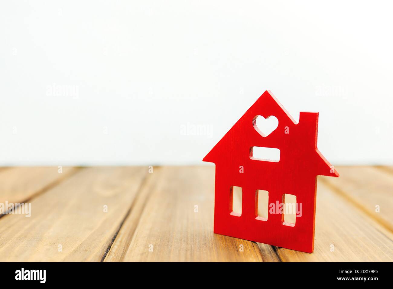 Family figure wooden house hi-res stock photography and images - Alamy