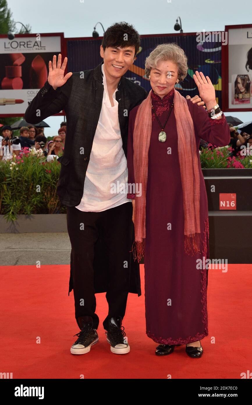 Actor Qin Hao and actress Lu Zhong attending the Chuangru Zhe (Red ...