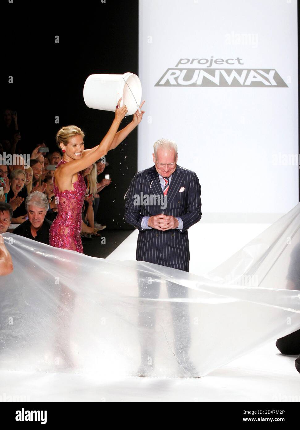 Heidi Klum helps Tim Gunn complete the Ice-Bucket Challenge while ...