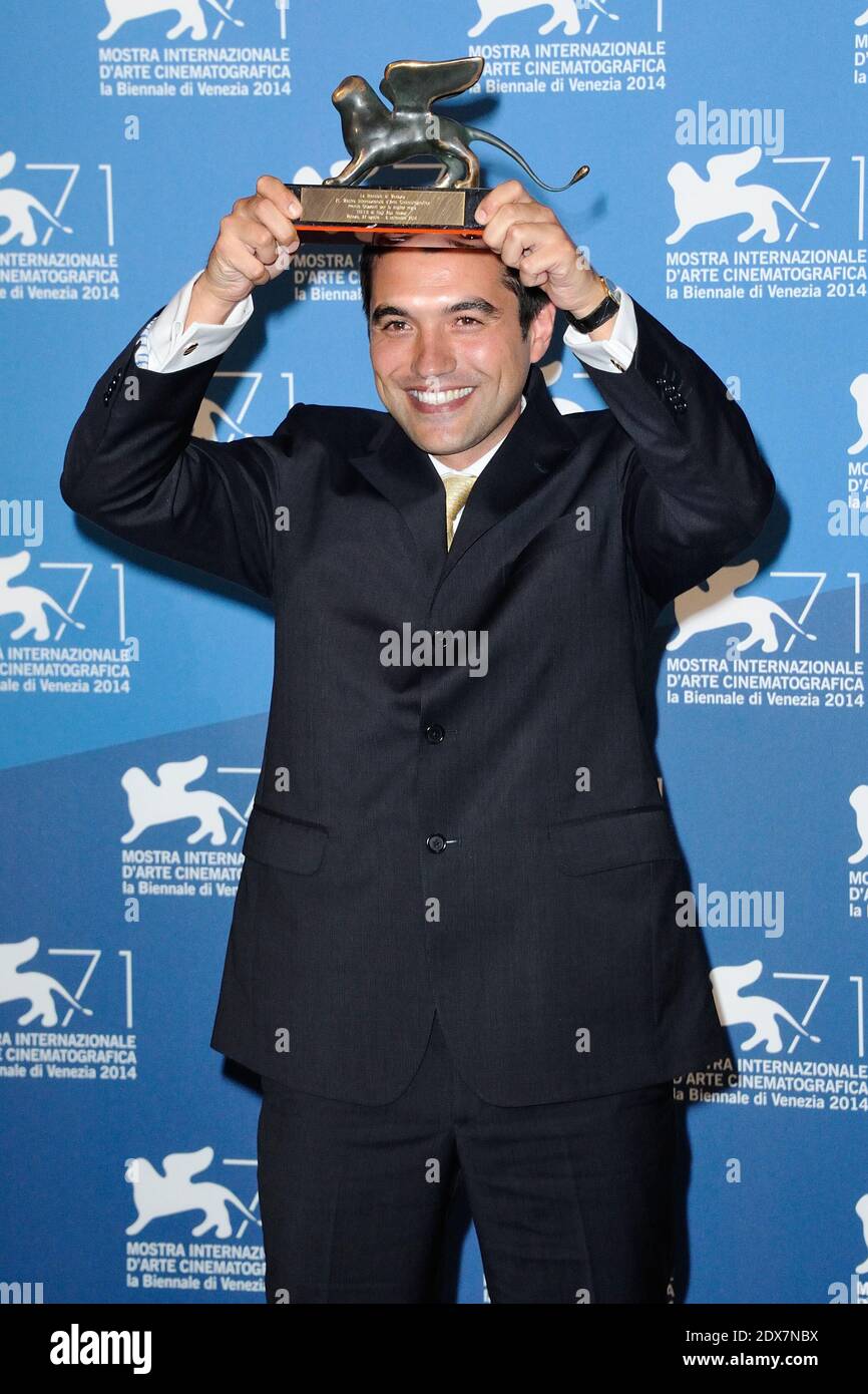 Director Naji Abu Nowar poses with his Orizzonti award for Best ...
