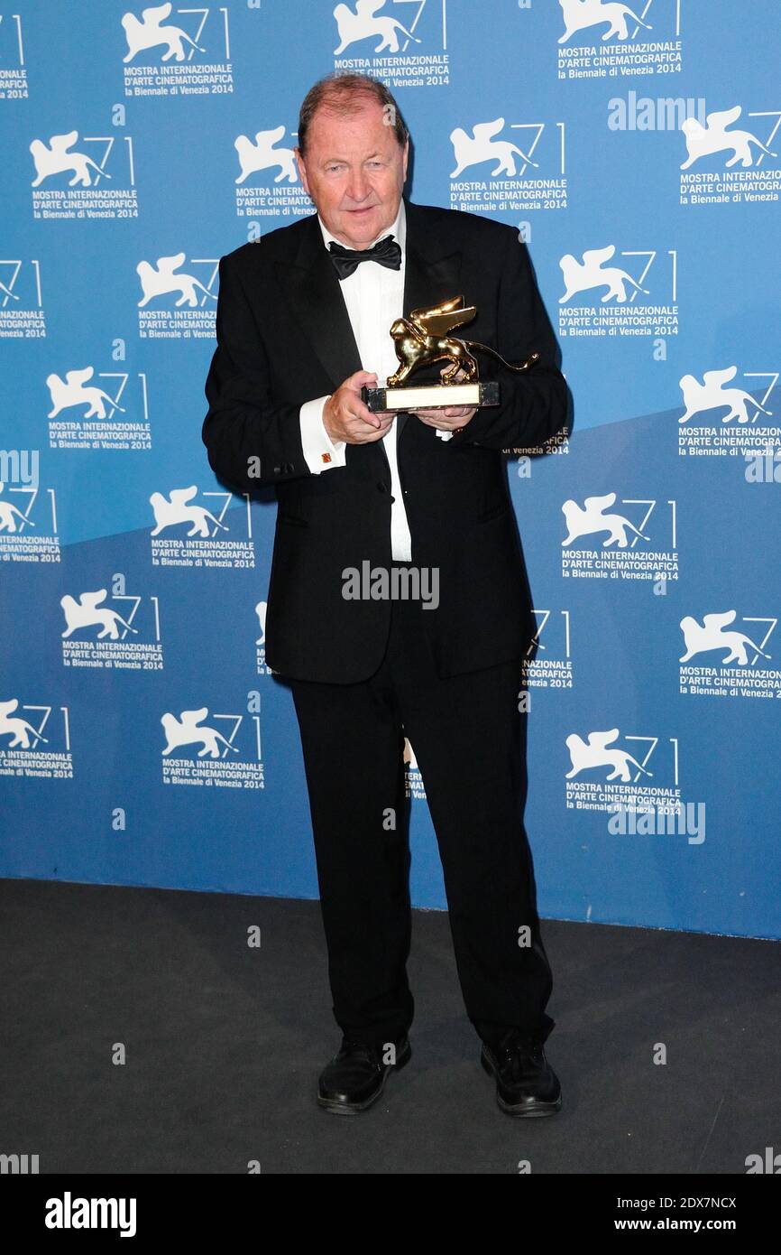 Director Roy Andersson poses with the Golden Lion Award for Best Film ...