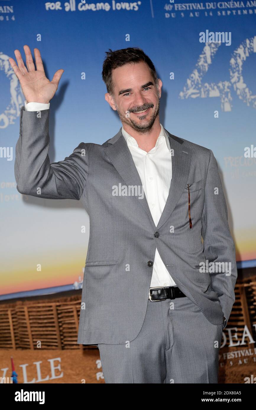 Peter Sattler posing at the Camp X-Ray photocall as part of the 40th ...