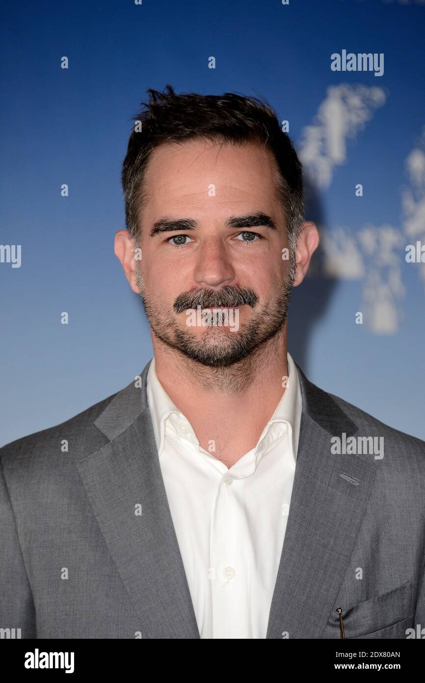 Peter Sattler posing at the Camp X-Ray photocall as part of the 40th ...