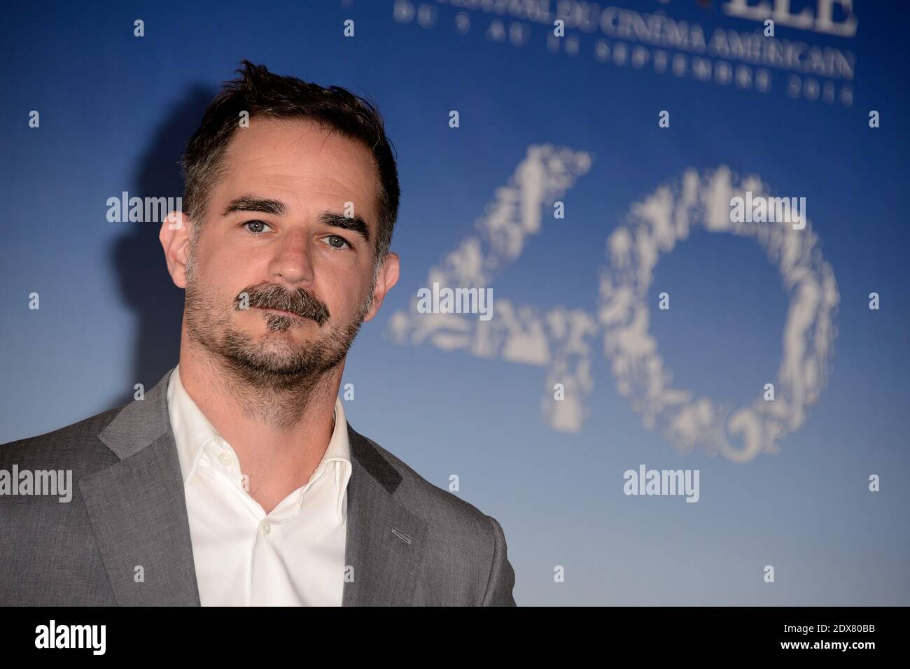Peter Sattler posing at the Camp X-Ray photocall as part of the 40th ...