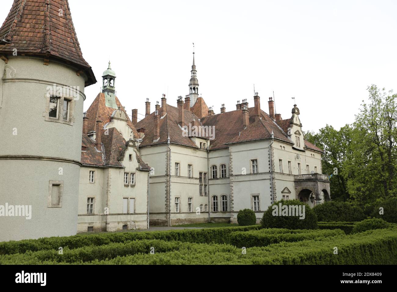Small castle with green grass in the front Stock Photo - Alamy