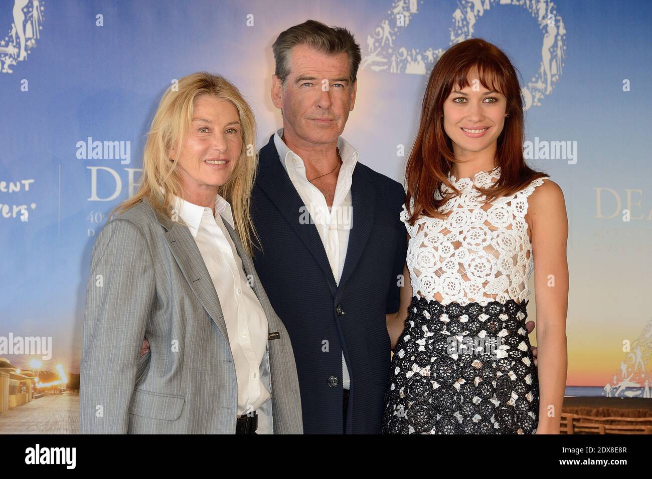 Beau St Clair, Pierce Brosnan and Olga Kurylenko posing at the 'The ...