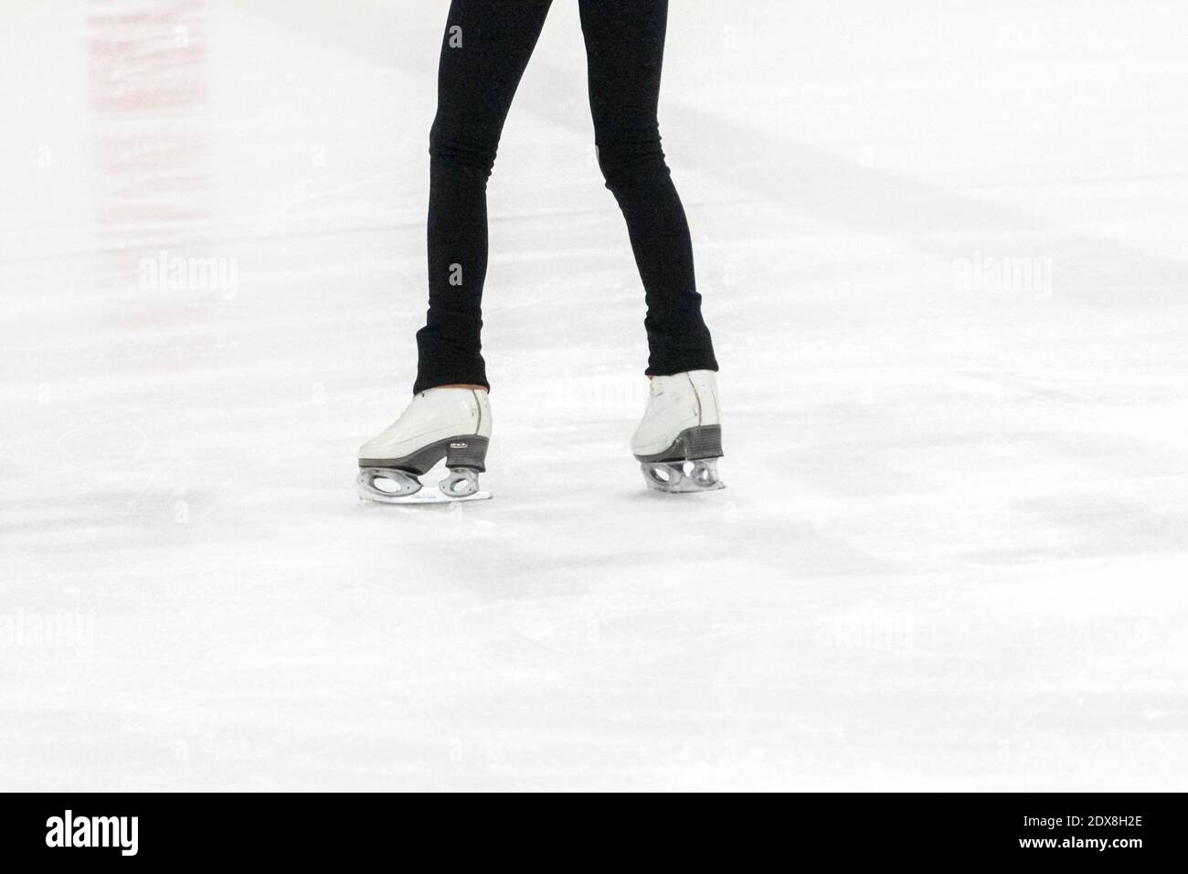 View of figure skater feet at the figure skating practice Stock Photo ...