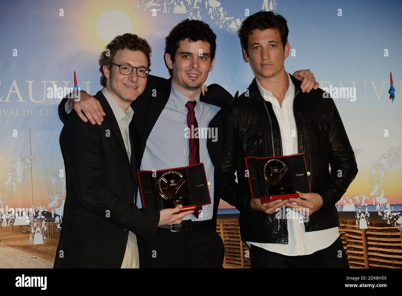 Nicholas Britell, Damien Chazelle and Miles Teller pose with the Grand ...