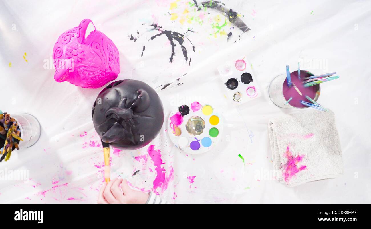 Flat lay. Painting craft pumpkin with acrylic paint for Halloween Stock ...