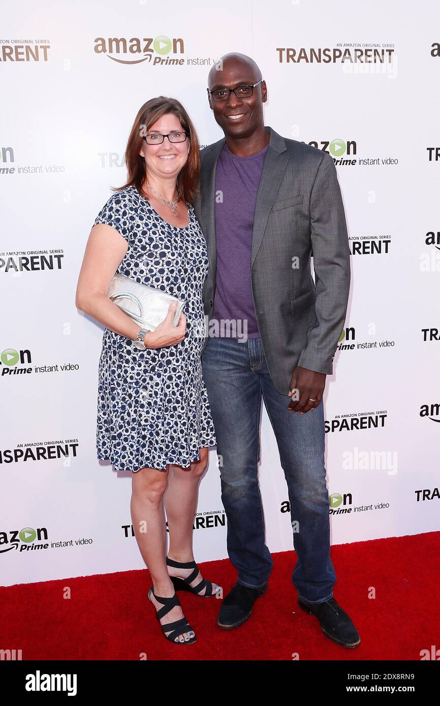 Lance Reddick and Stephanie Reddick attend the Amazon red carpet ...