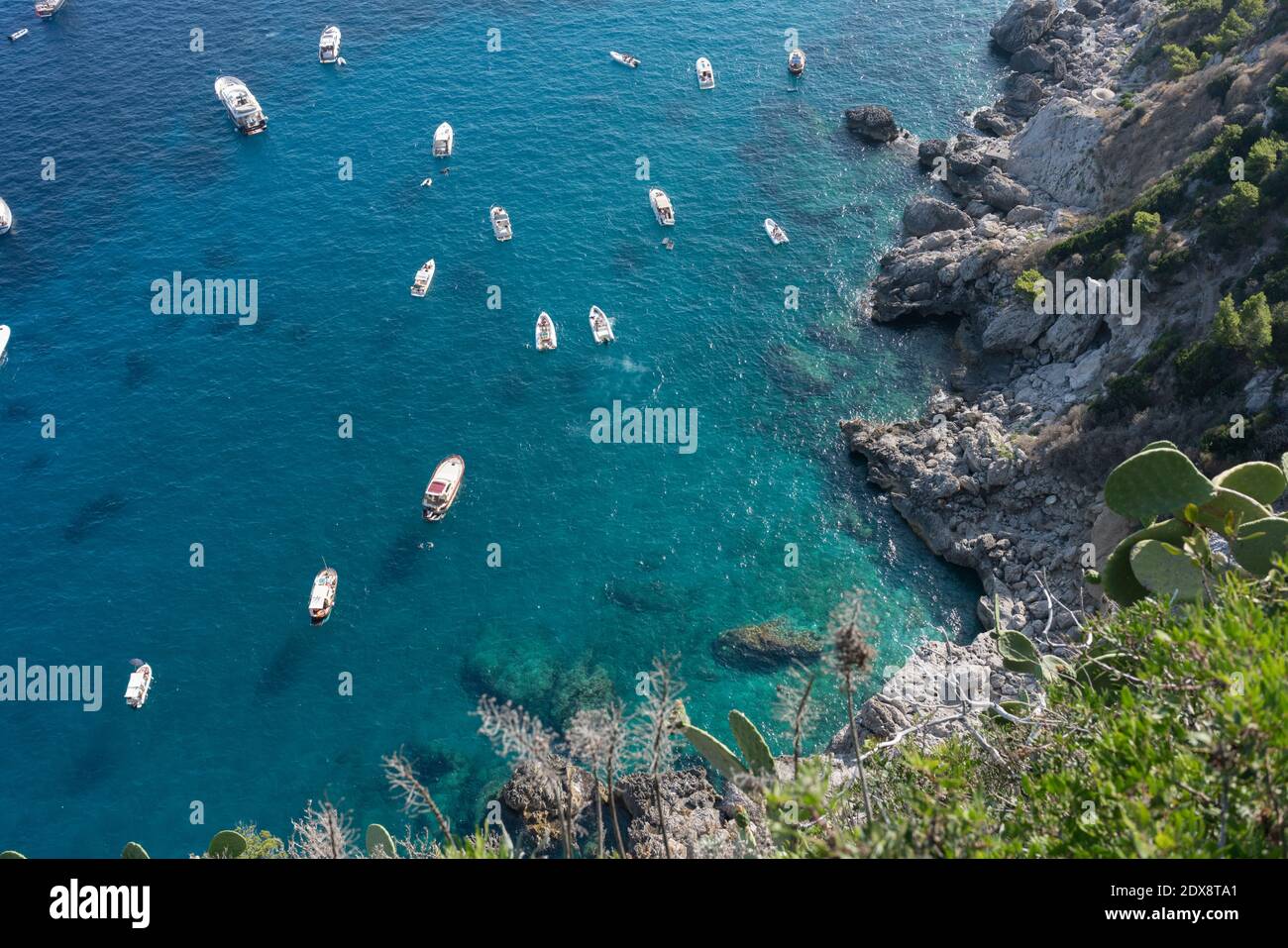 Italy Capri Boats and Yachts Below Capri Town Sit In Bue Water Stock ...