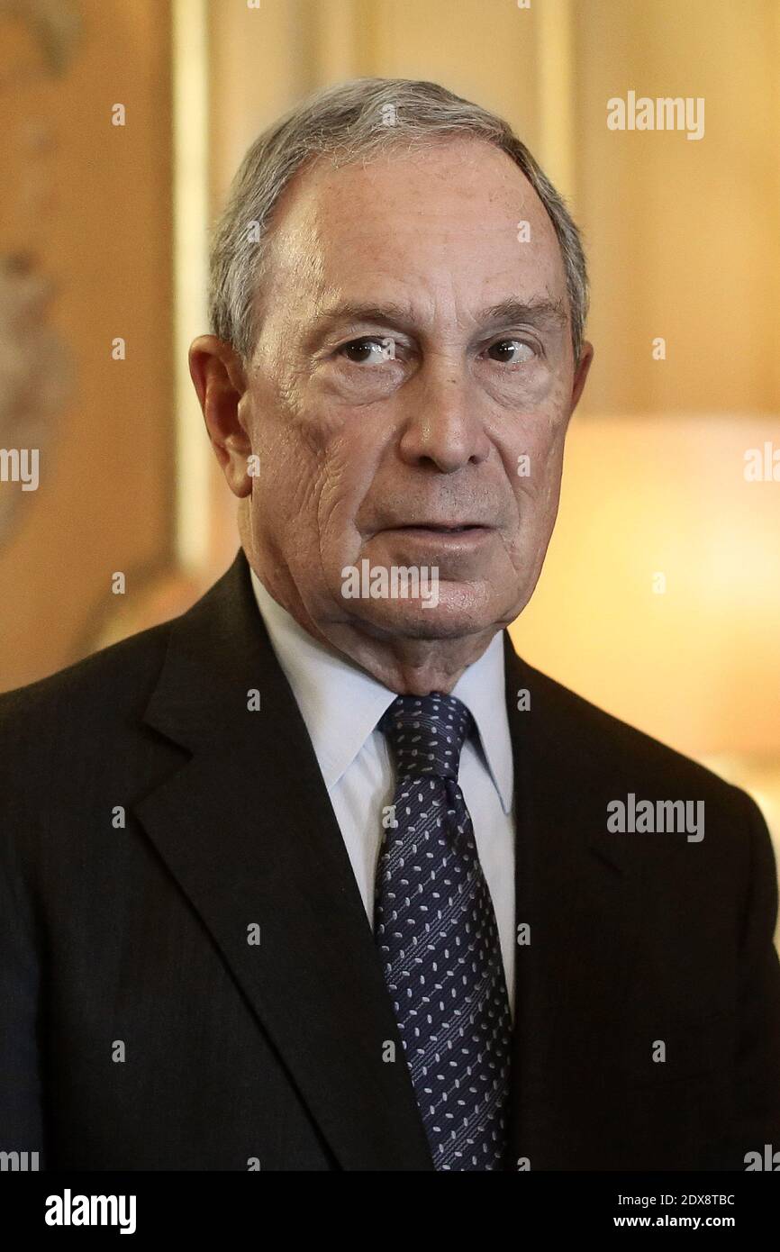 Former New York Mayor Michael Bloomberg next his wife is pictured ...