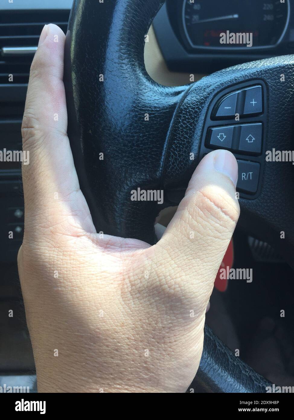 Hand pressing steering wheel hi-res stock photography and images - Alamy
