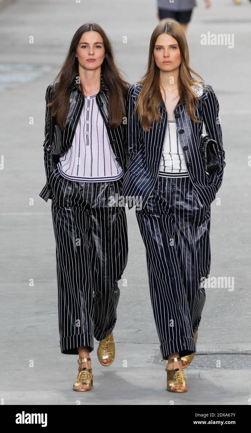 Models walk the runway during the Chanel show as part of the Paris ...