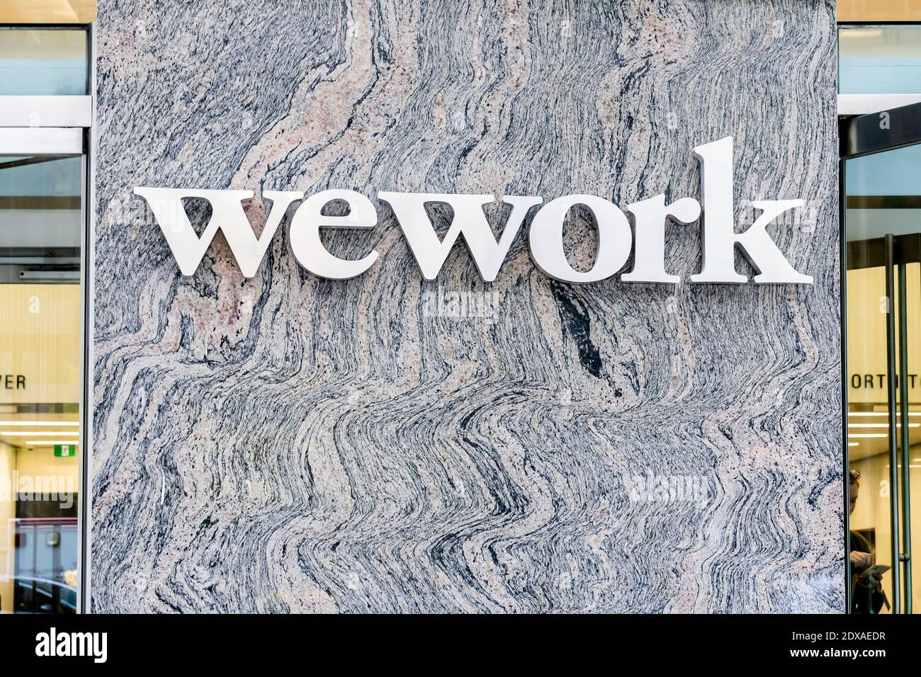 Coloseup of WeWork sign on the builing in downtown Toronto, Canada ...
