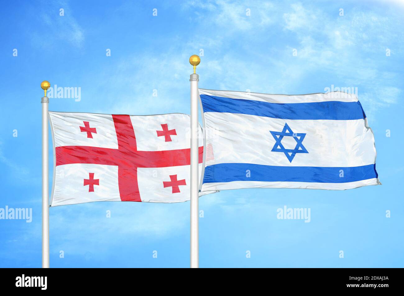 Georgia and Israel two flags on flagpoles and blue sky Stock Photo - Alamy