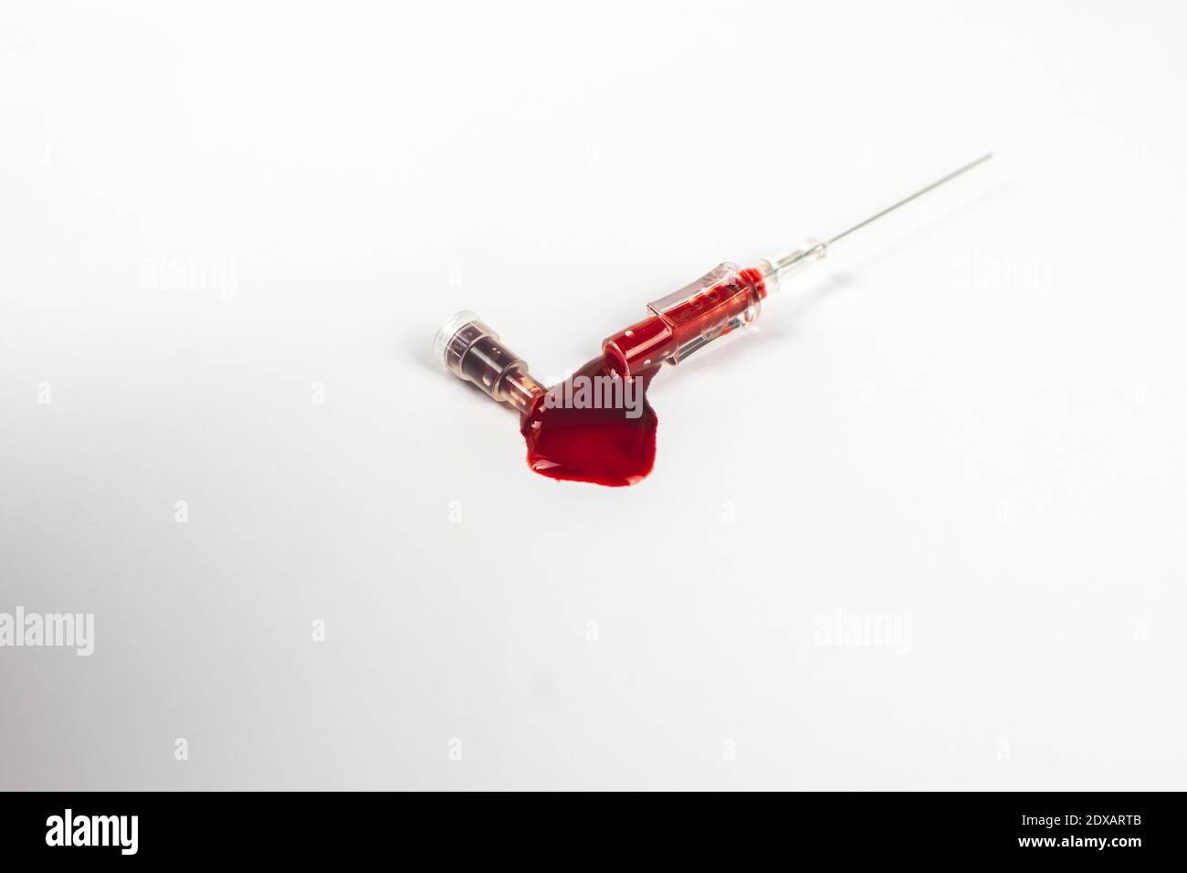 High Angle View Of Red Flag Against White Background Stock Photo - Alamy