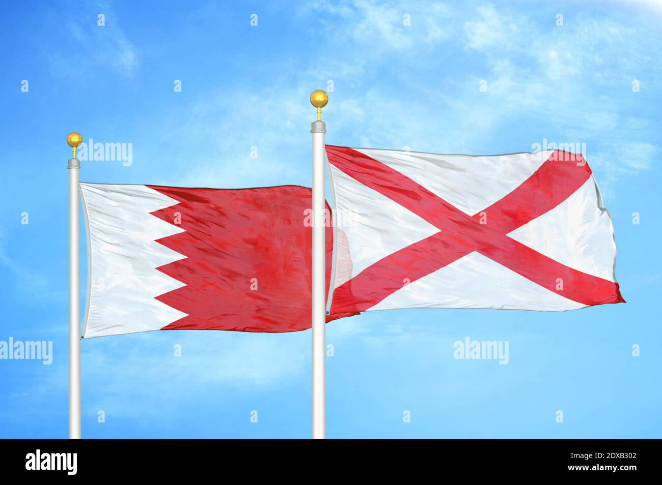 Bahrain and Northern Ireland two flags on flagpoles and blue sky Stock ...