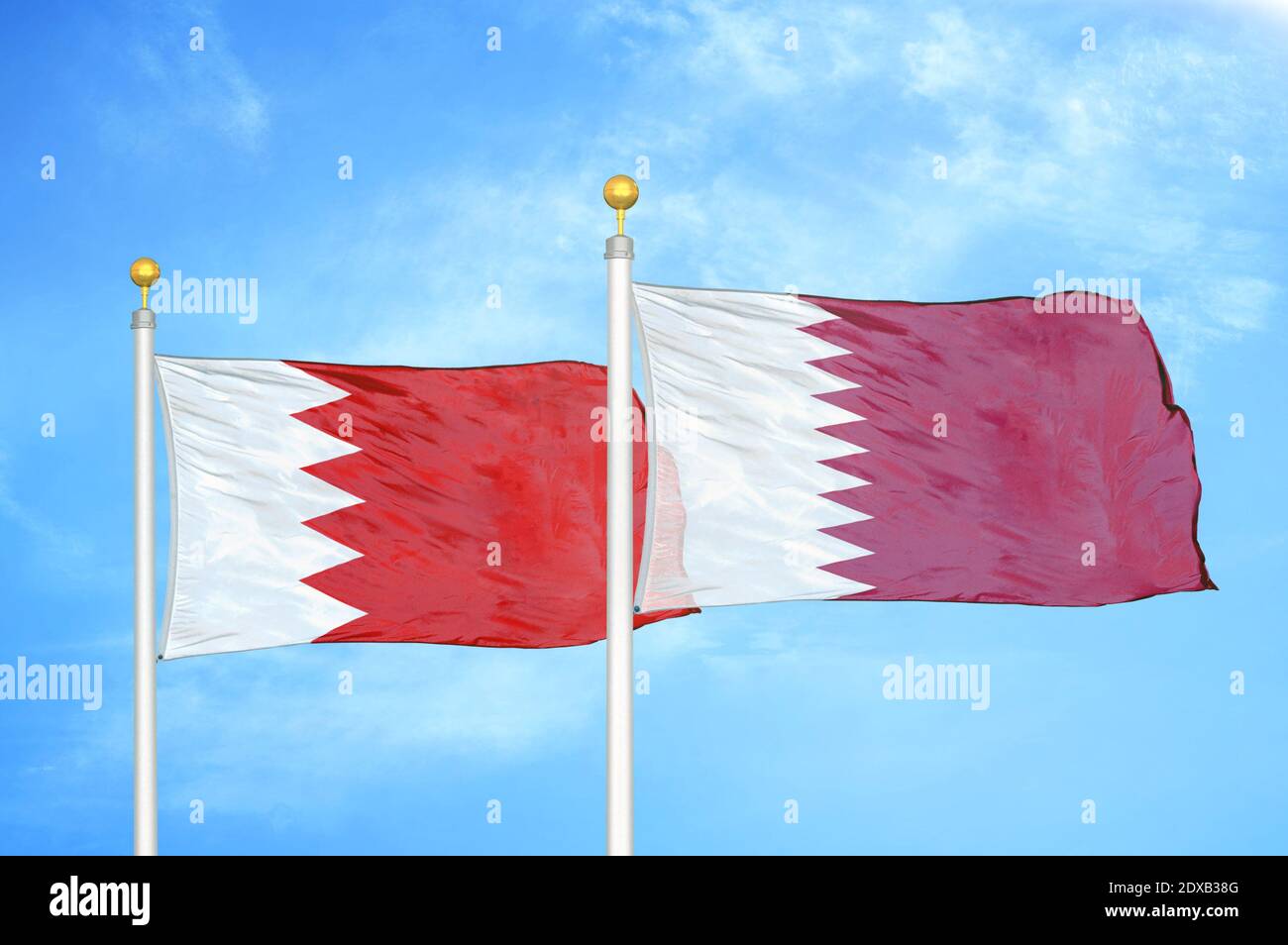 Bahrain and Qatar two flags on flagpoles and blue sky Stock Photo - Alamy