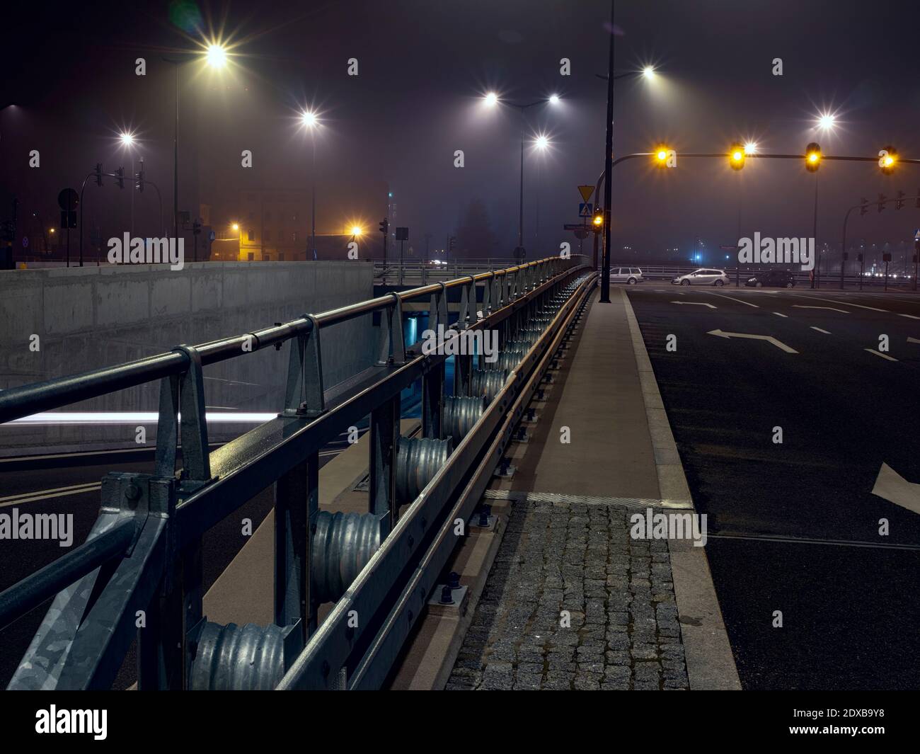 Foggy Night City Lights And Road Scene Stock Photo - Alamy