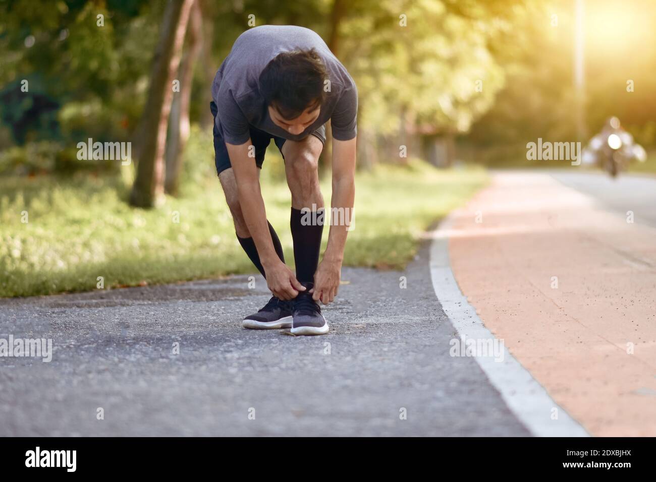 Asian man runner sprinting outdoor hi-res stock photography and images ...
