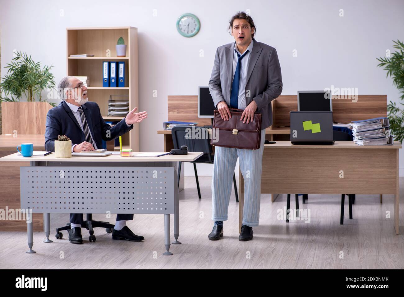 Young employee being late for work Stock Photo - Alamy