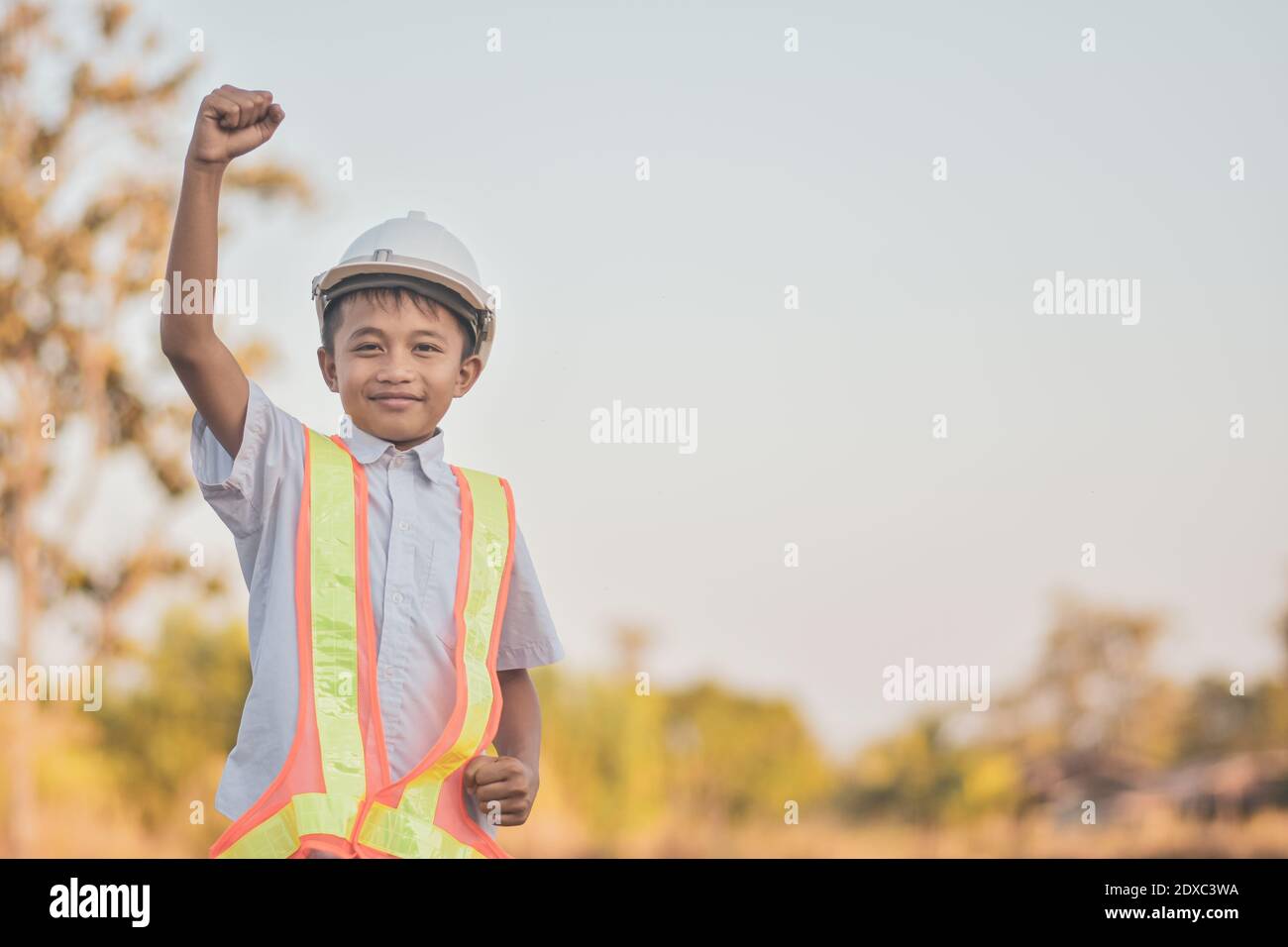 Boy white helmet hard hat safety showing hand up success,Engineering ...