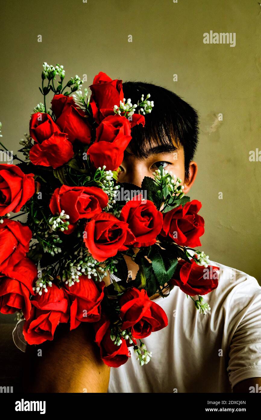 Boy With Roses High Resolution Stock Photography and Images - Alamy