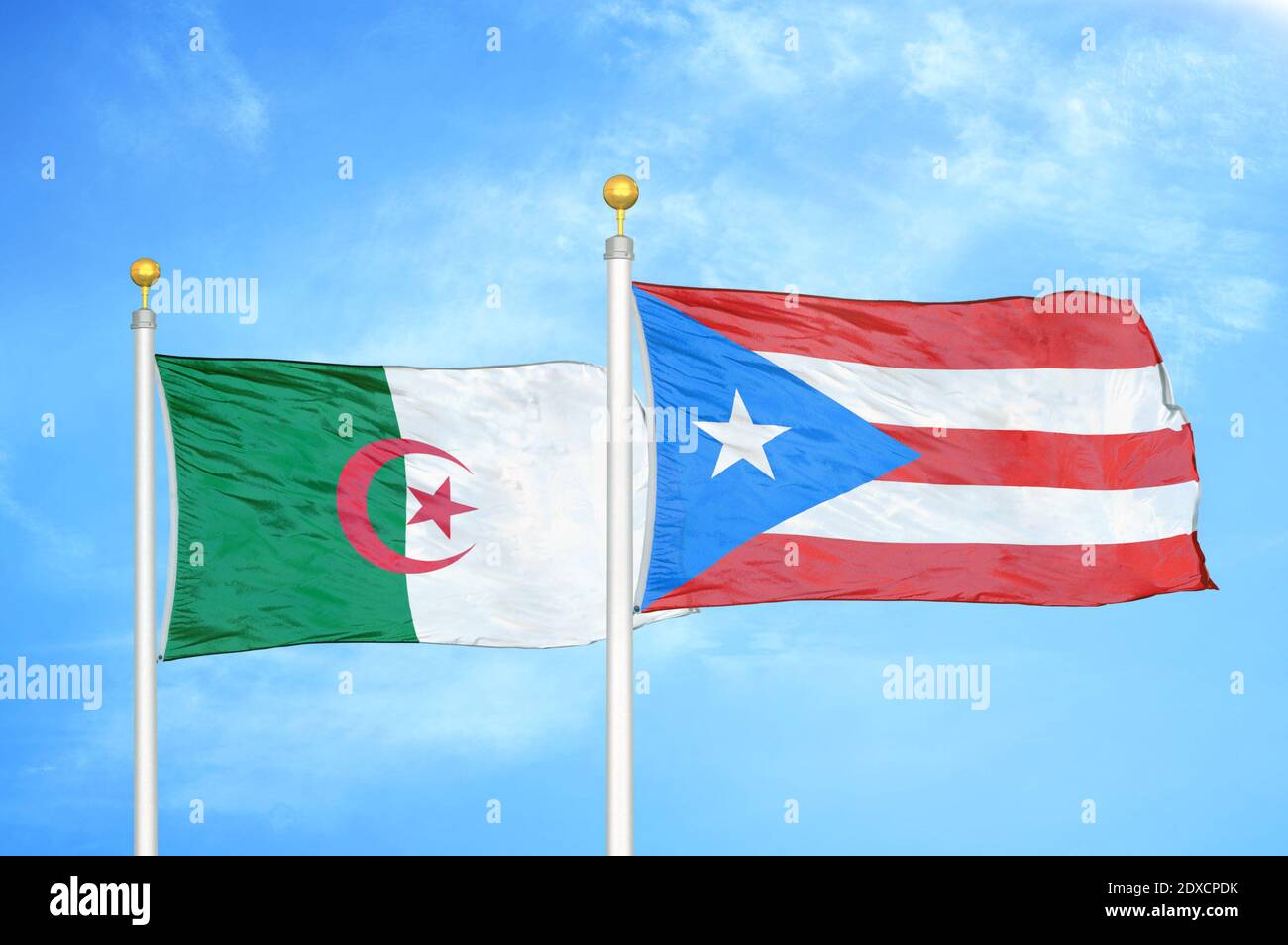 Algeria and Puerto Rico two flags on flagpoles and blue sky Stock Photo ...
