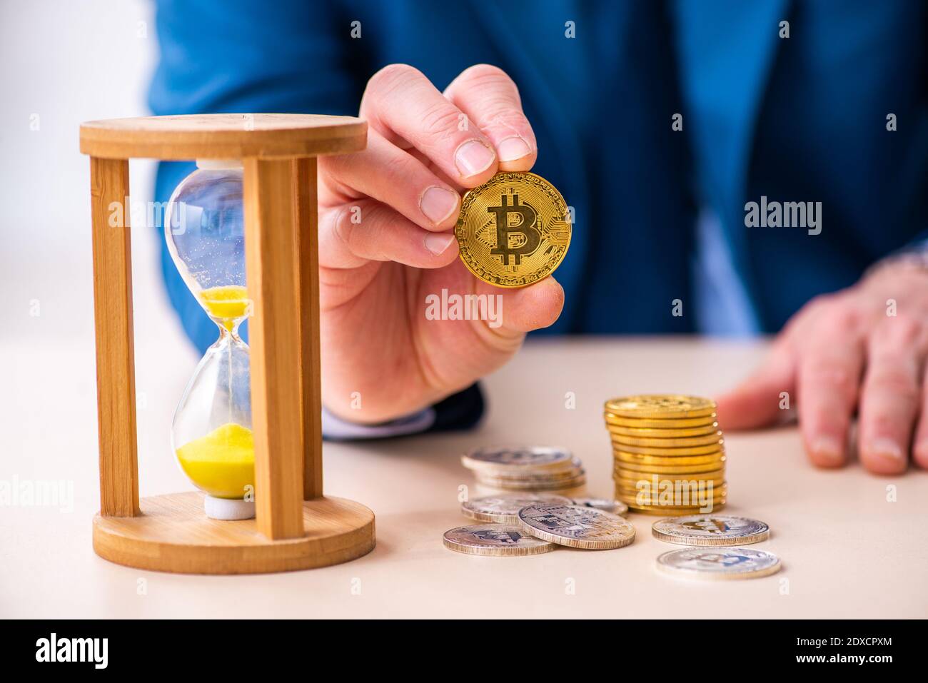 Man earning money via Internet in time management concept Stock Photo ...