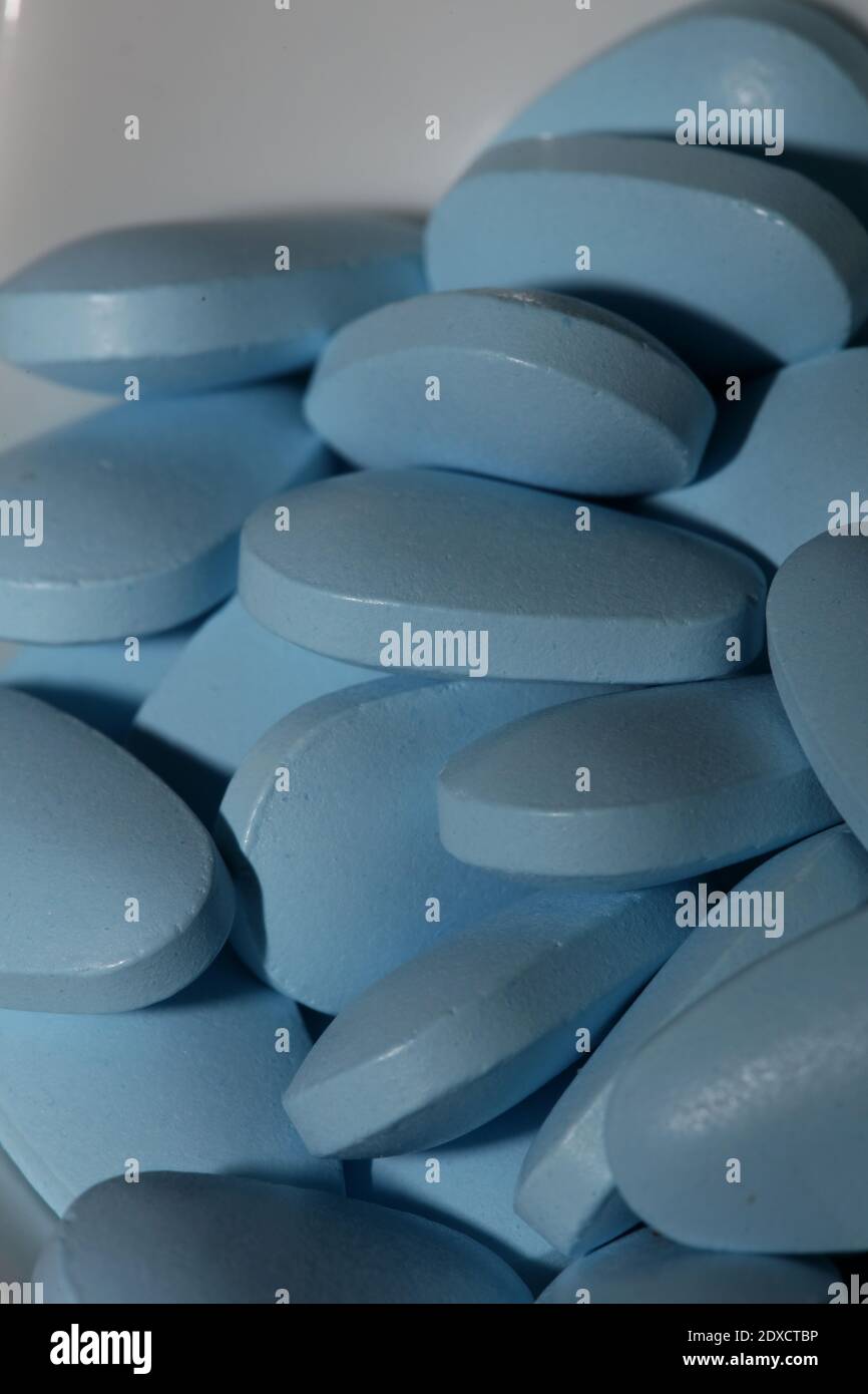 Blue medical pills close up modern background high quality print Stock ...