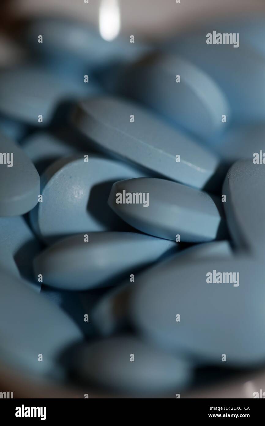 Blue medical pills close up modern background high quality print Stock ...