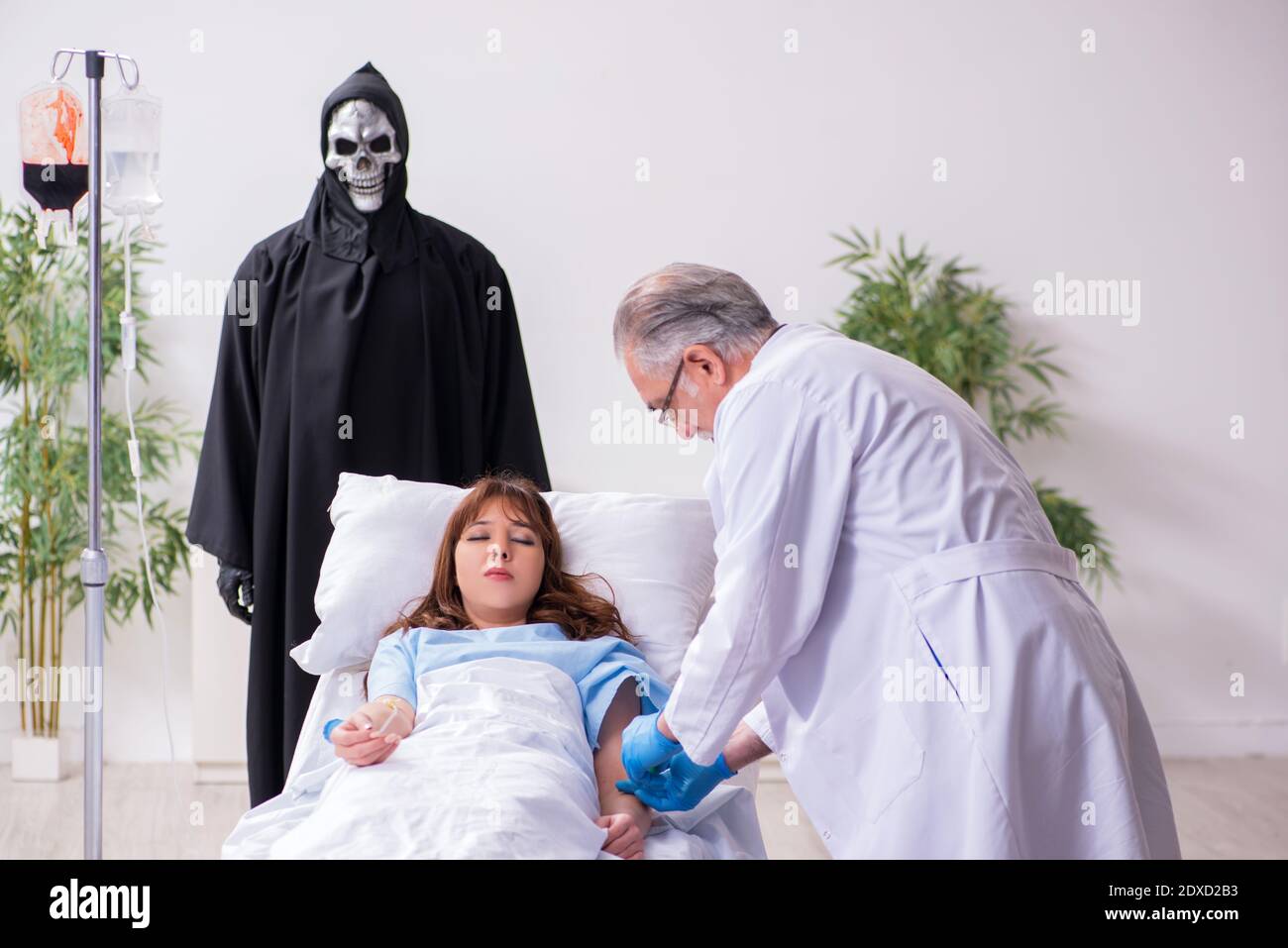Devil, old doctor and female patient in clinic Stock Photo - Alamy