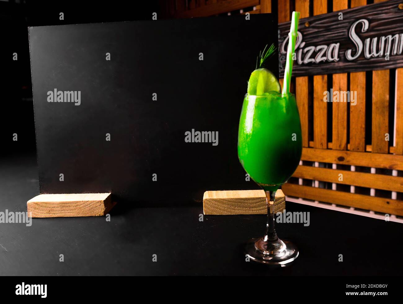 Green cocktail in Open Air Bar Stock Photo - Alamy