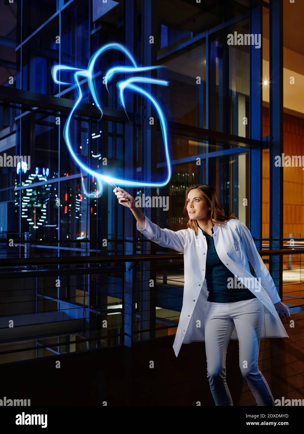 Female cardiologist examining heart in laboratory at hospital Stock ...