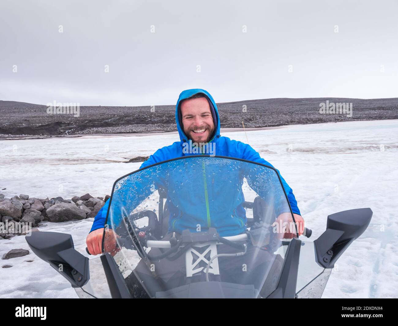 Man riding snowmobile hi-res stock photography and images - Alamy