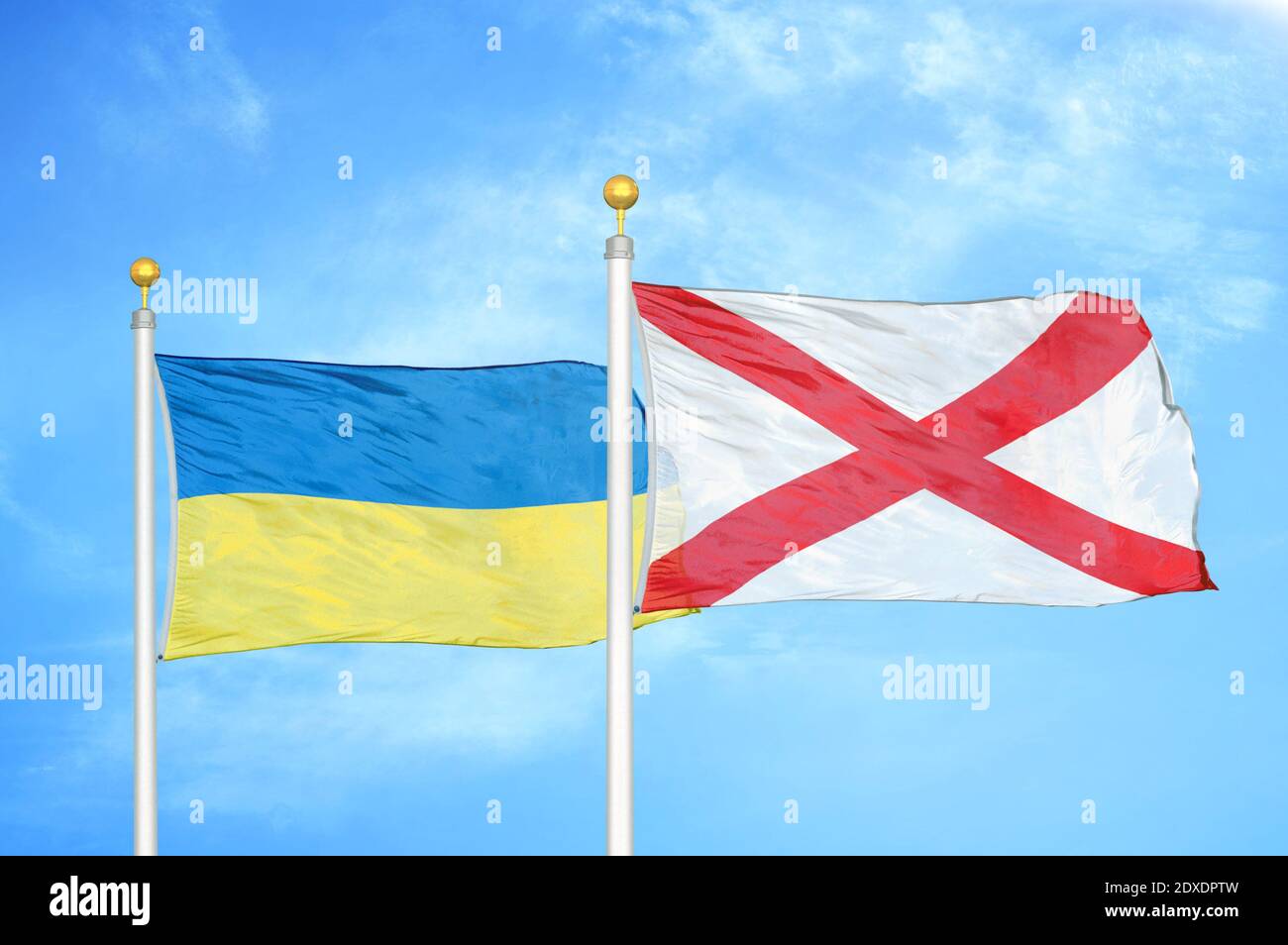 Ukraine and Northern Ireland two flags on flagpoles and blue sky Stock ...