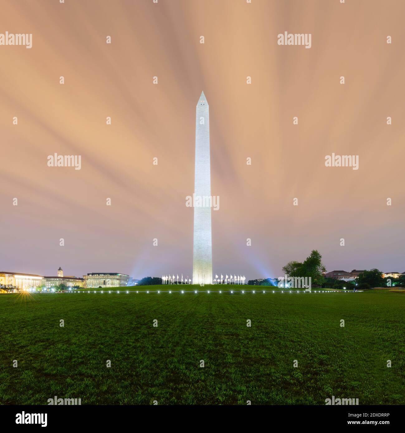 USA, Washington DC, Cloudy sky over lawn in front of Washington ...